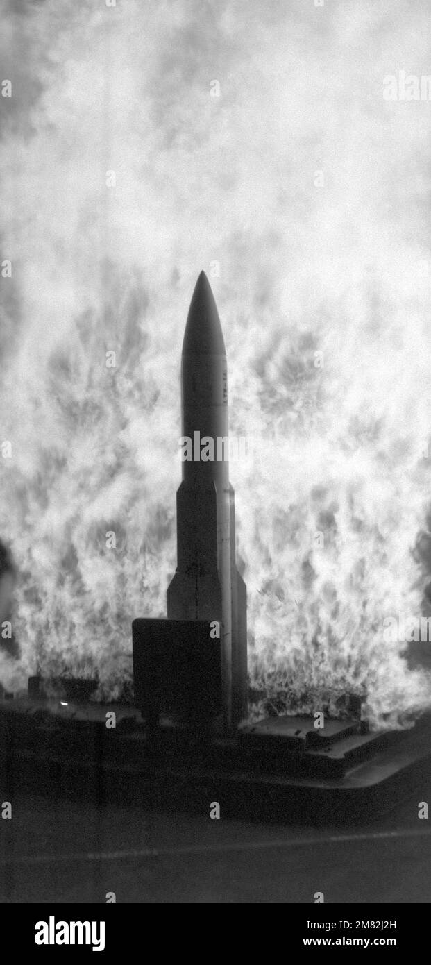 A Standard-2 missile is fired from its vertical launch system (VLS ...