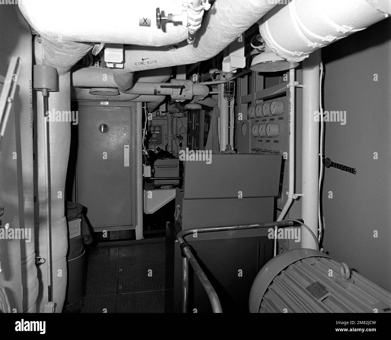 The lower level engine room aboard the guided missile frigate ROBERT G ...