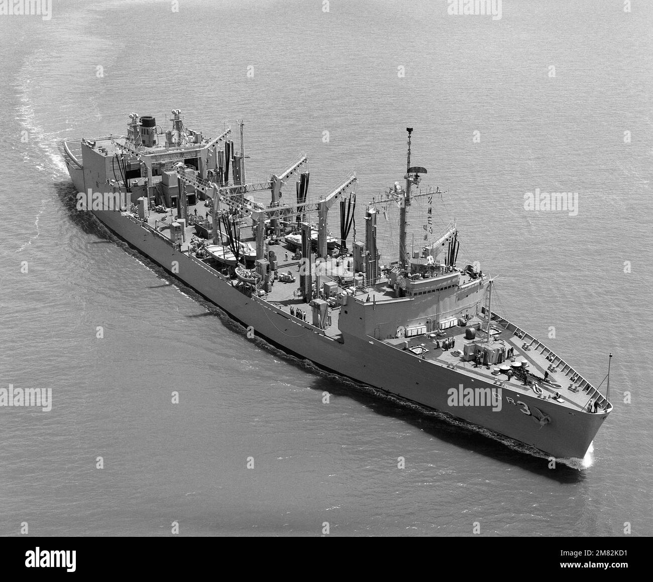 An aerial starboard bow view of the replenishment oiler USS KANSAS CITY ...