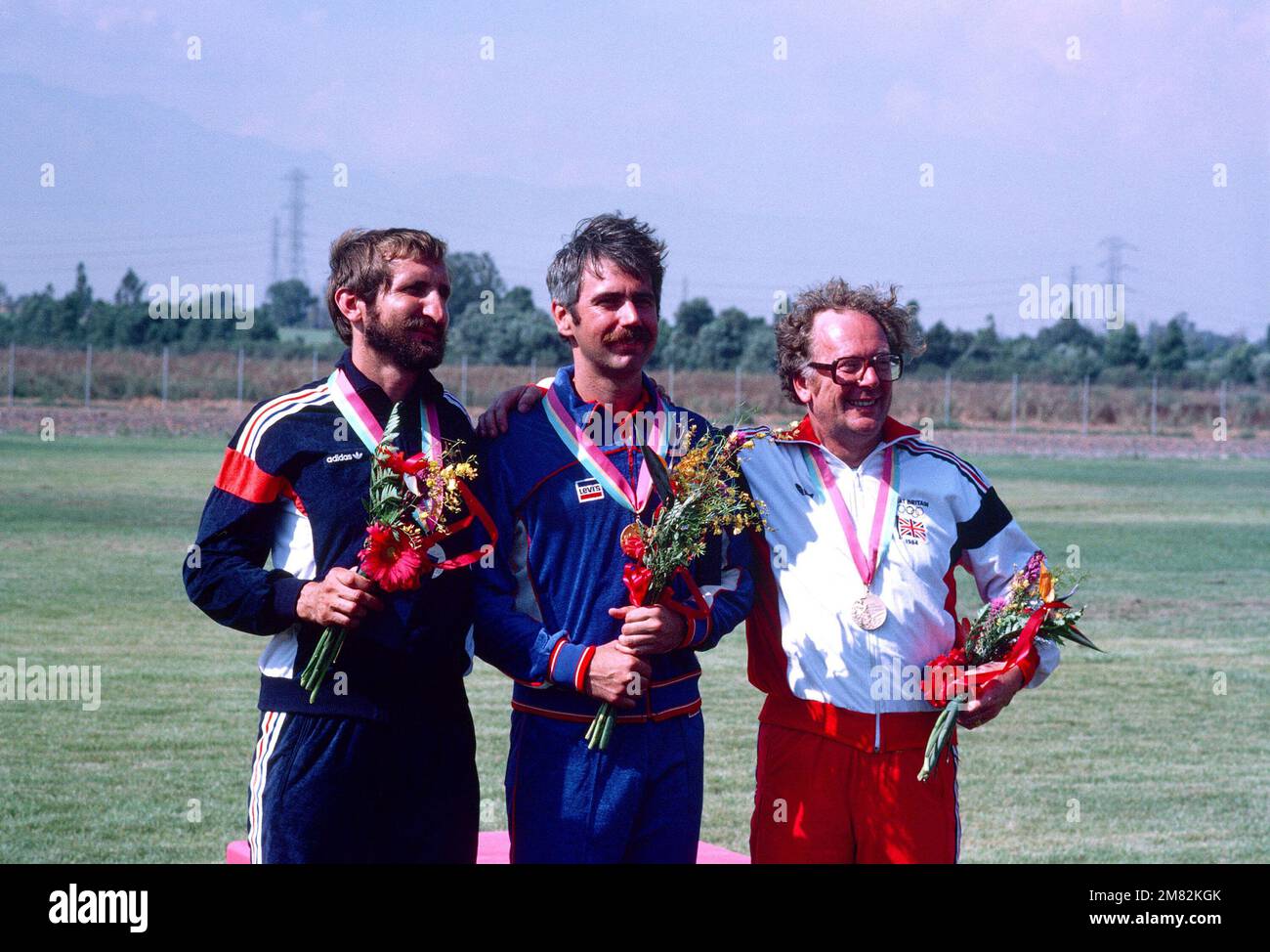 Army Captain Edward F. Etzel, center, from Morgantown, West Virginia ...