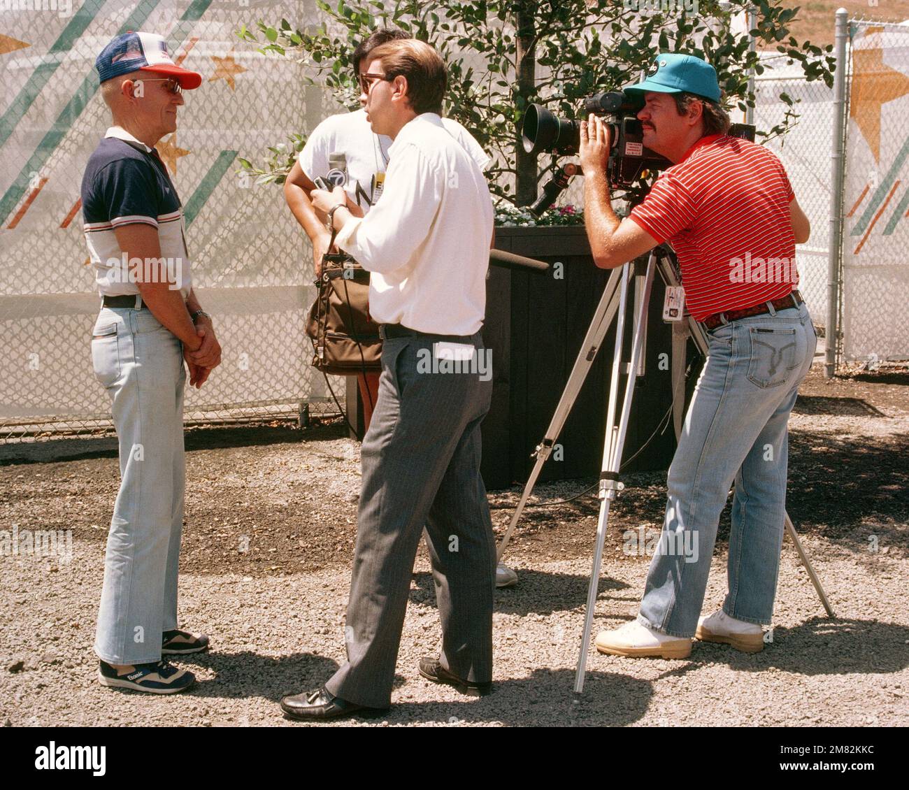 Joe Berry, left, US Army (Ret.) from Washington, DC, is interviewed for ...