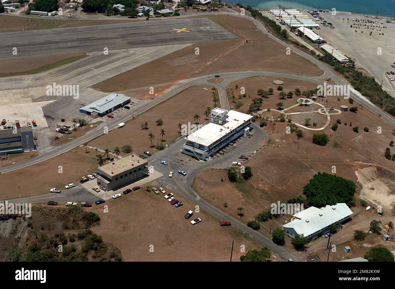 Aerial view of buildings with recently replaced roofs. In the center is ...
