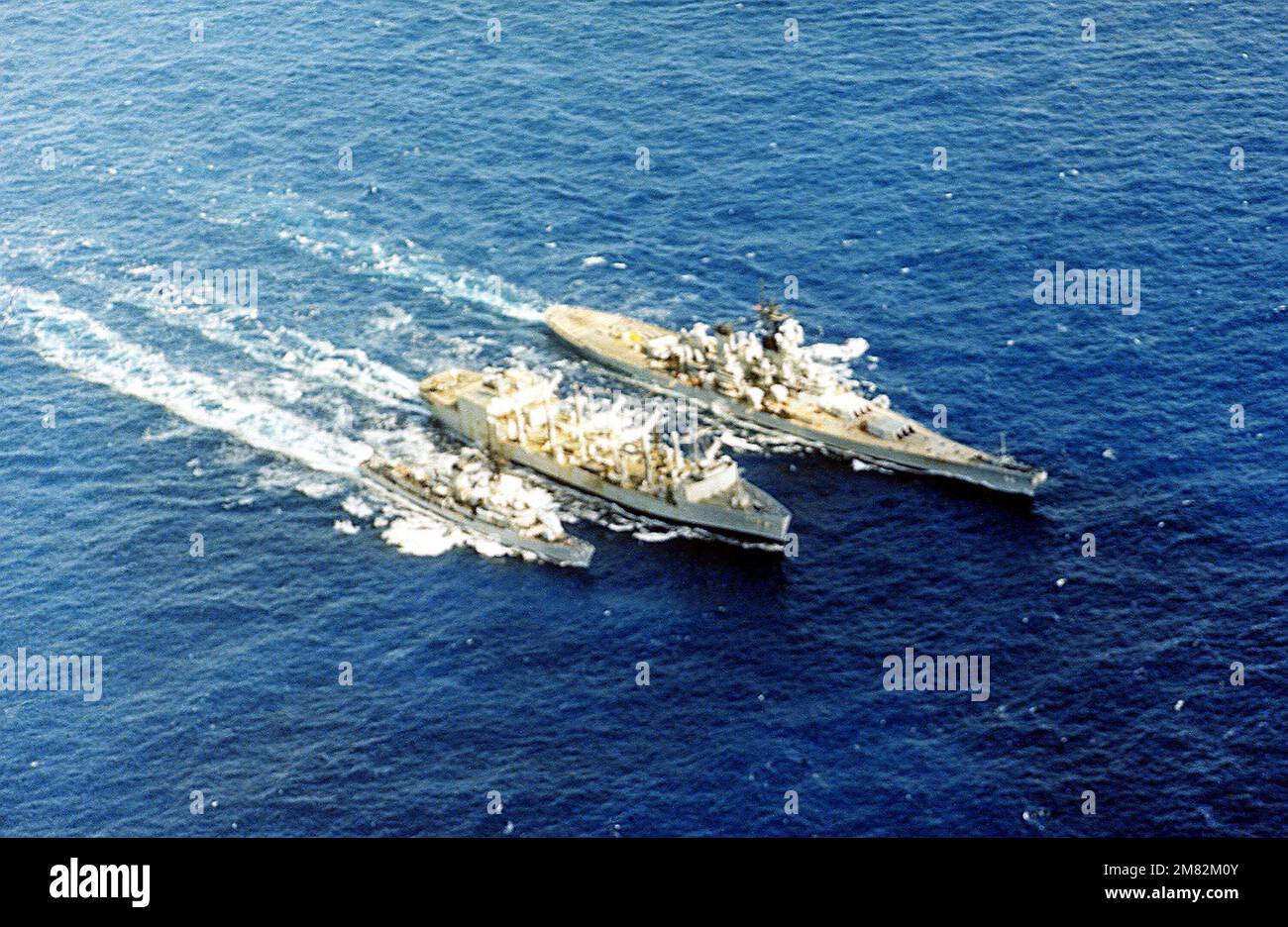An aerial starboard bow view of the battleship USS NEW JERSEY (BB-62 ...