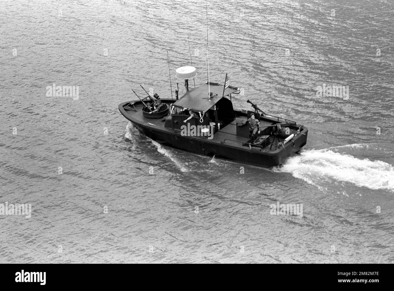 A Pbr Mark Ii River Patrol Boat Escorts The Battleship Uss Iowa Bb 61 Through The Canal Base