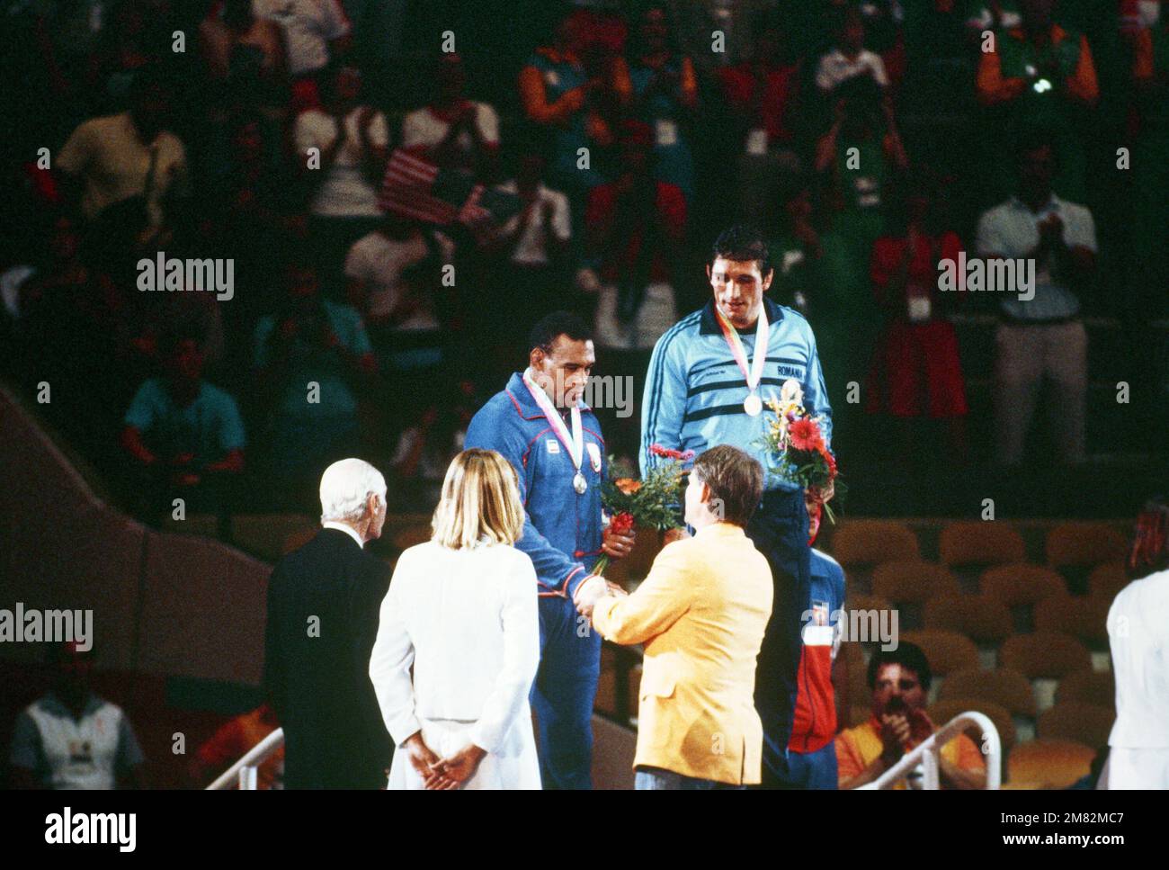Marine Corps Sergeant Greg Gibson is congratulated after receiving the ...