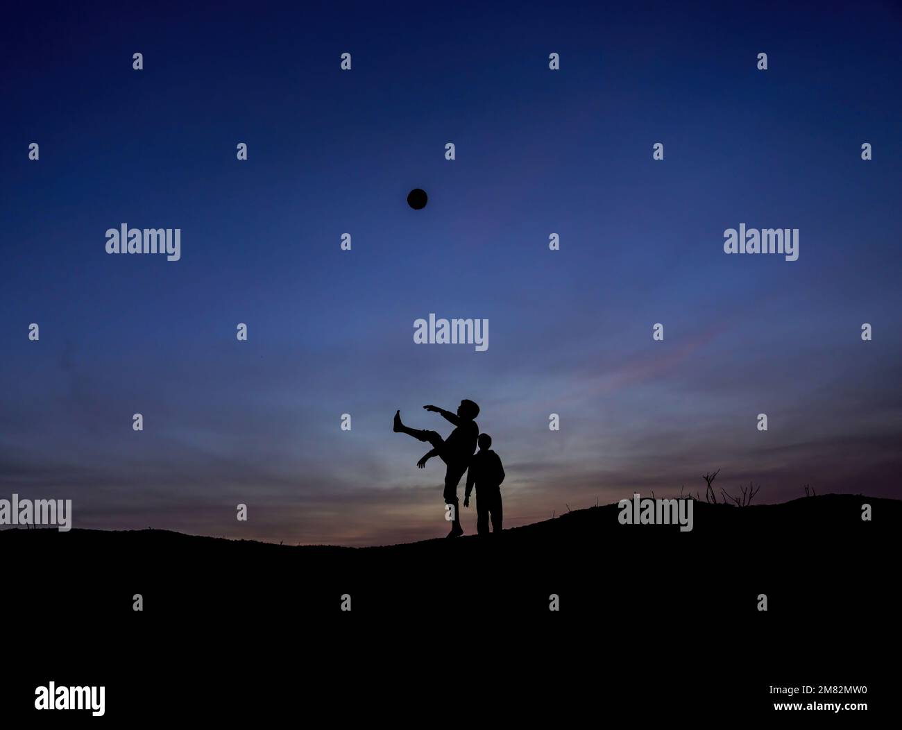 Palestinian children play football in hi-res stock photography and ...