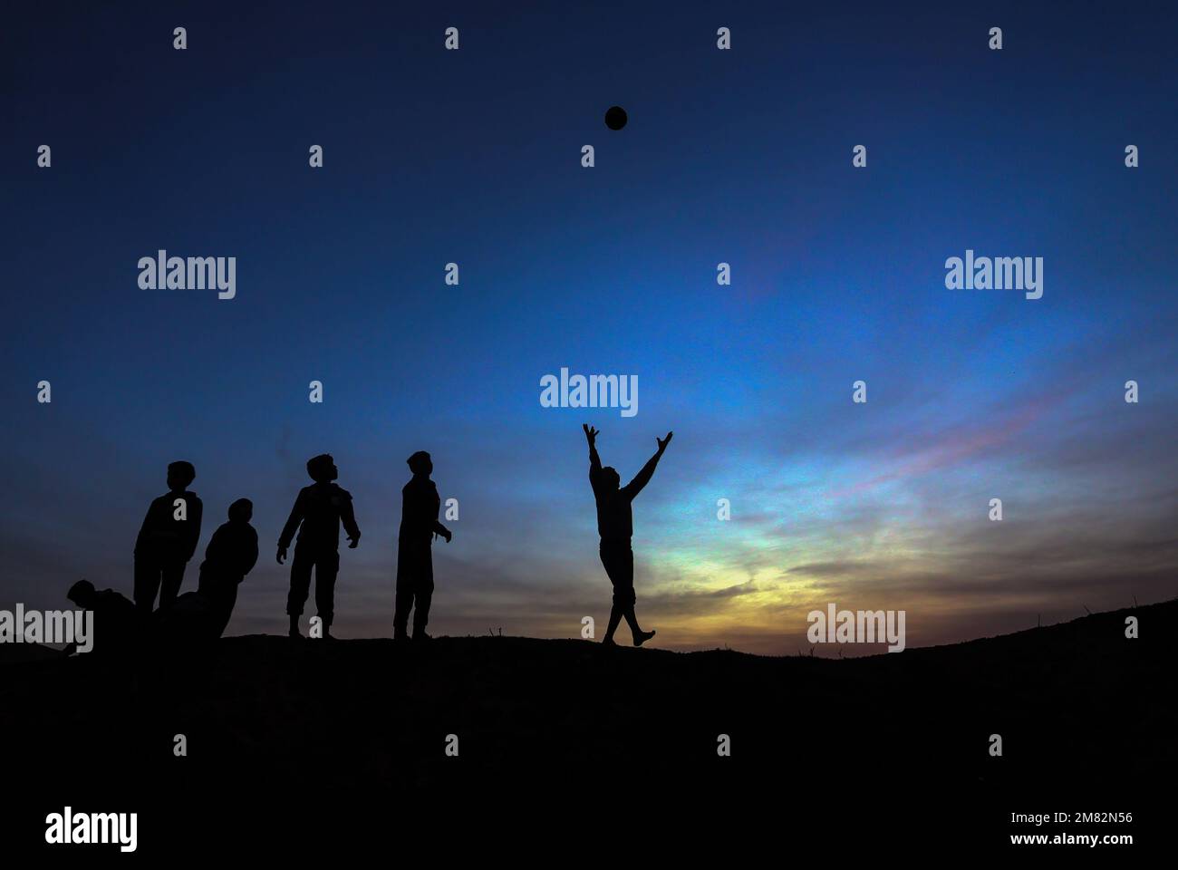 Palestinian children play football in hi-res stock photography and ...
