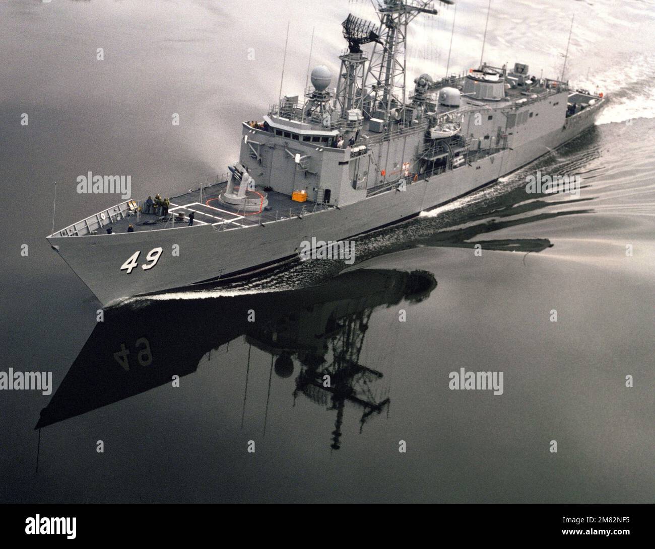 An aerial port bow view of the guided missile frigate ROBERT G. BRADLEY ...