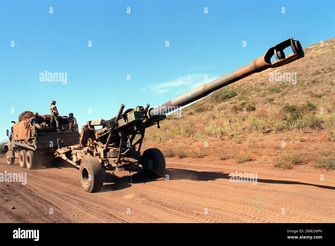 An M-198 155mm howitzer is towed to the Pohakuloa Training Area for a ...