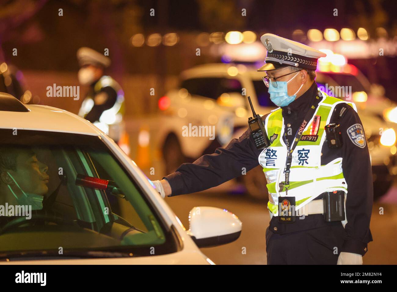 ZHOUSHAN, CHINA - JANUARY 11, 2023 - Traffic police carry out night ...