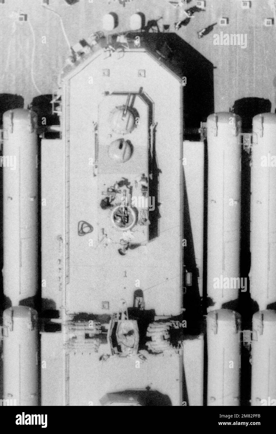 A close-up vertical view of the 30 mm gun mounts and SS-N-12 missile ...