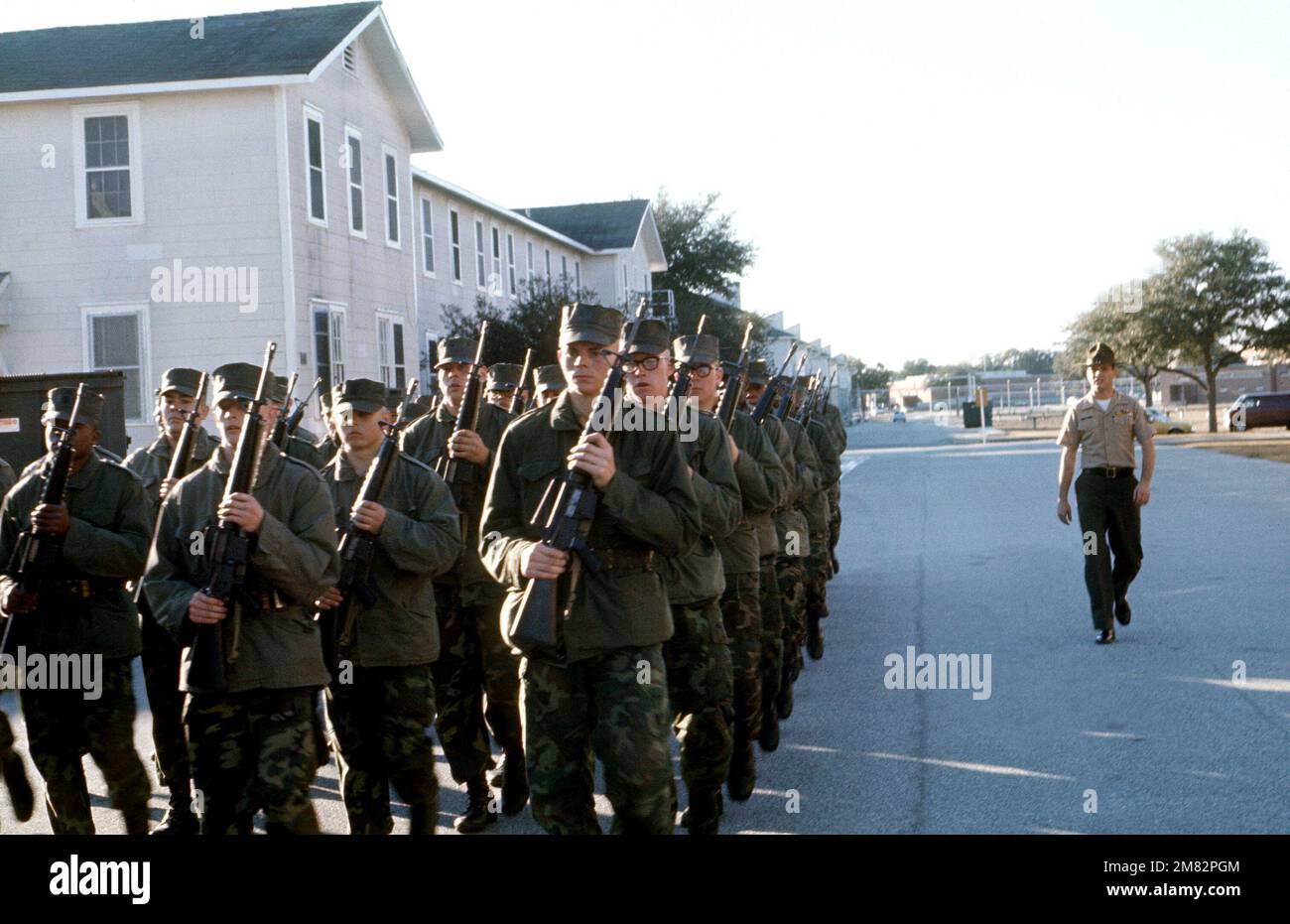 Marine recruits drill with M16A1 rifles during basic training at the ...
