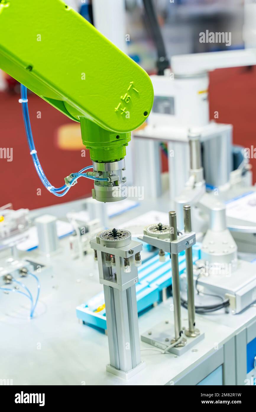 Automatic robot in a smart factory. Assembly line Stock Photo - Alamy