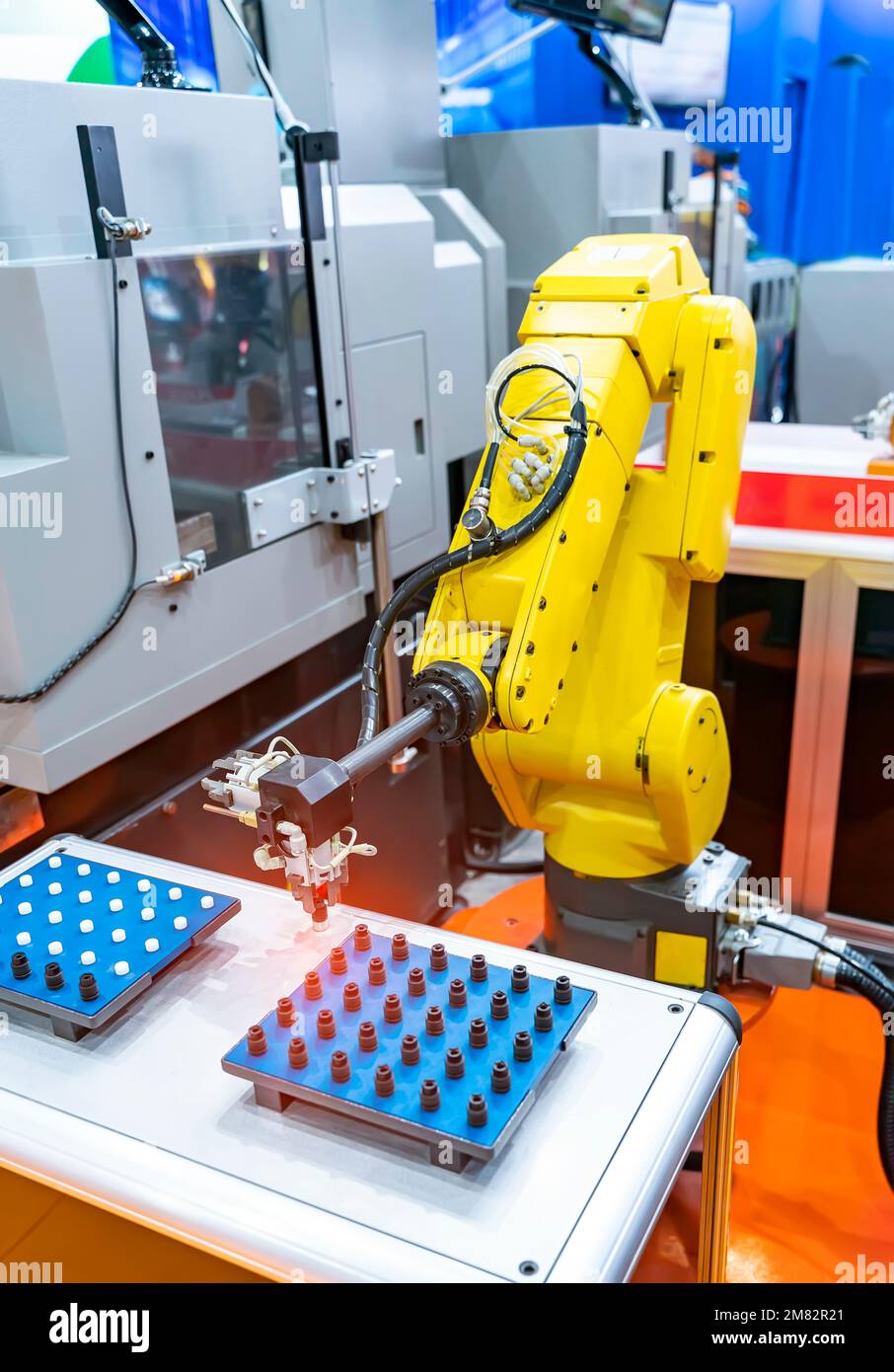 Automatic robot in a smart factory. Assembly line Stock Photo - Alamy