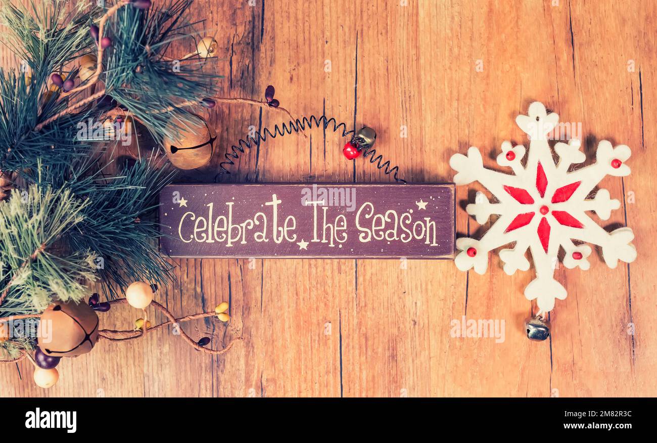 celebrate the season written on wooden background with snowflake Stock ...