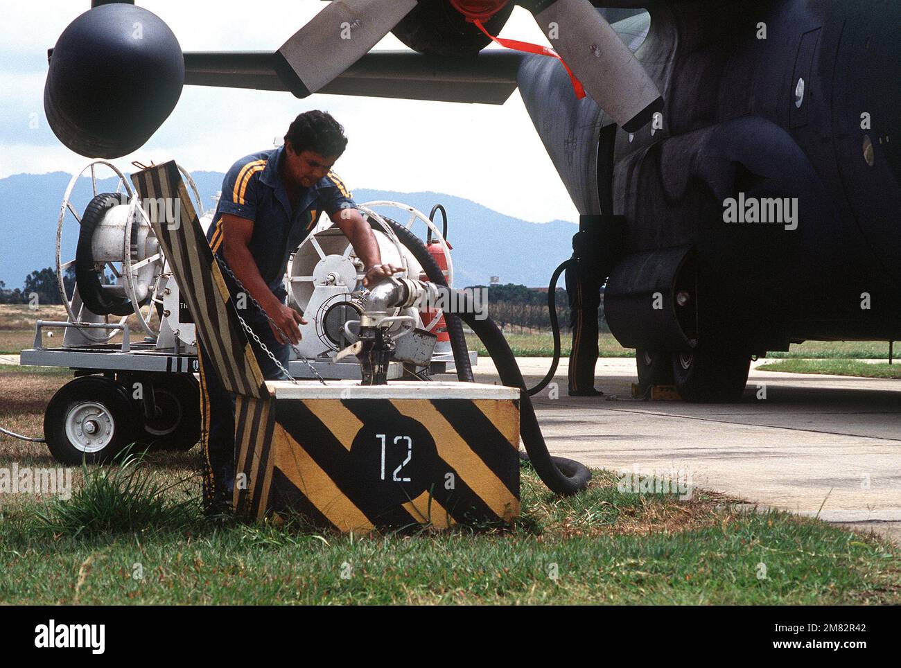 Brazilian air force personnel refuel a 50th Tactical Airlift Squadron C ...