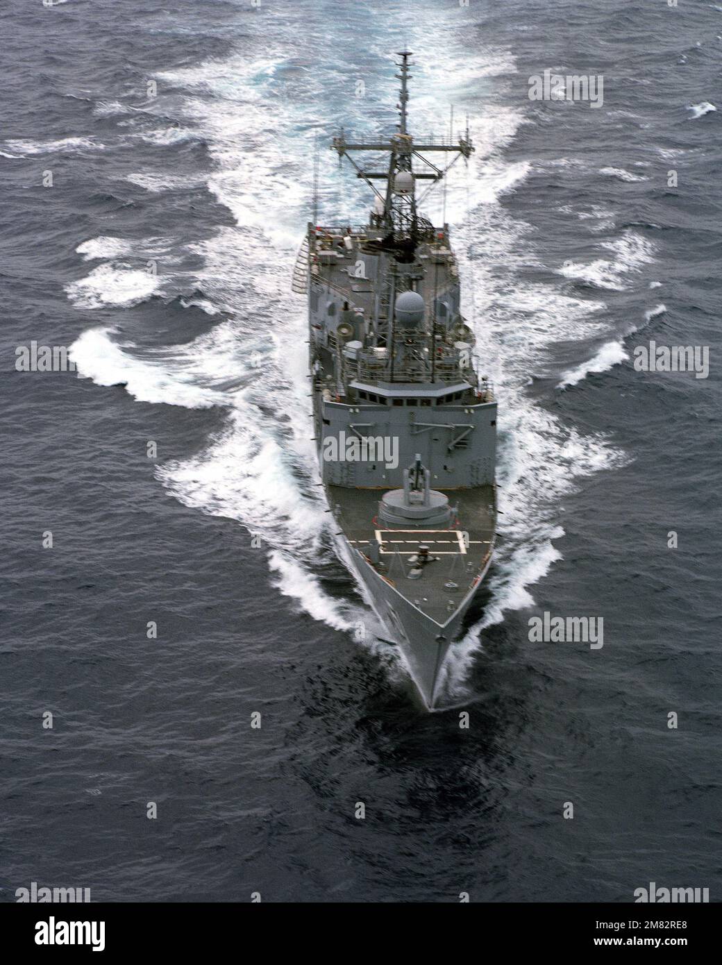 An aerial bow view of the Oliver Hazard Perry class guided missile ...