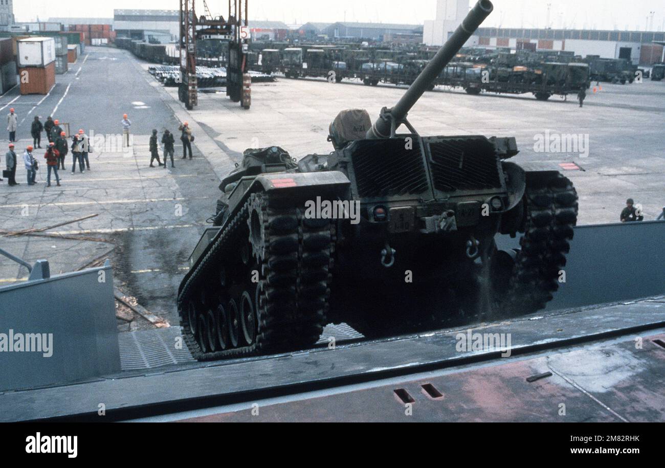 An M60 tank rolls off the vehicle cargo/rapid-response ship USNS ALGOL ...
