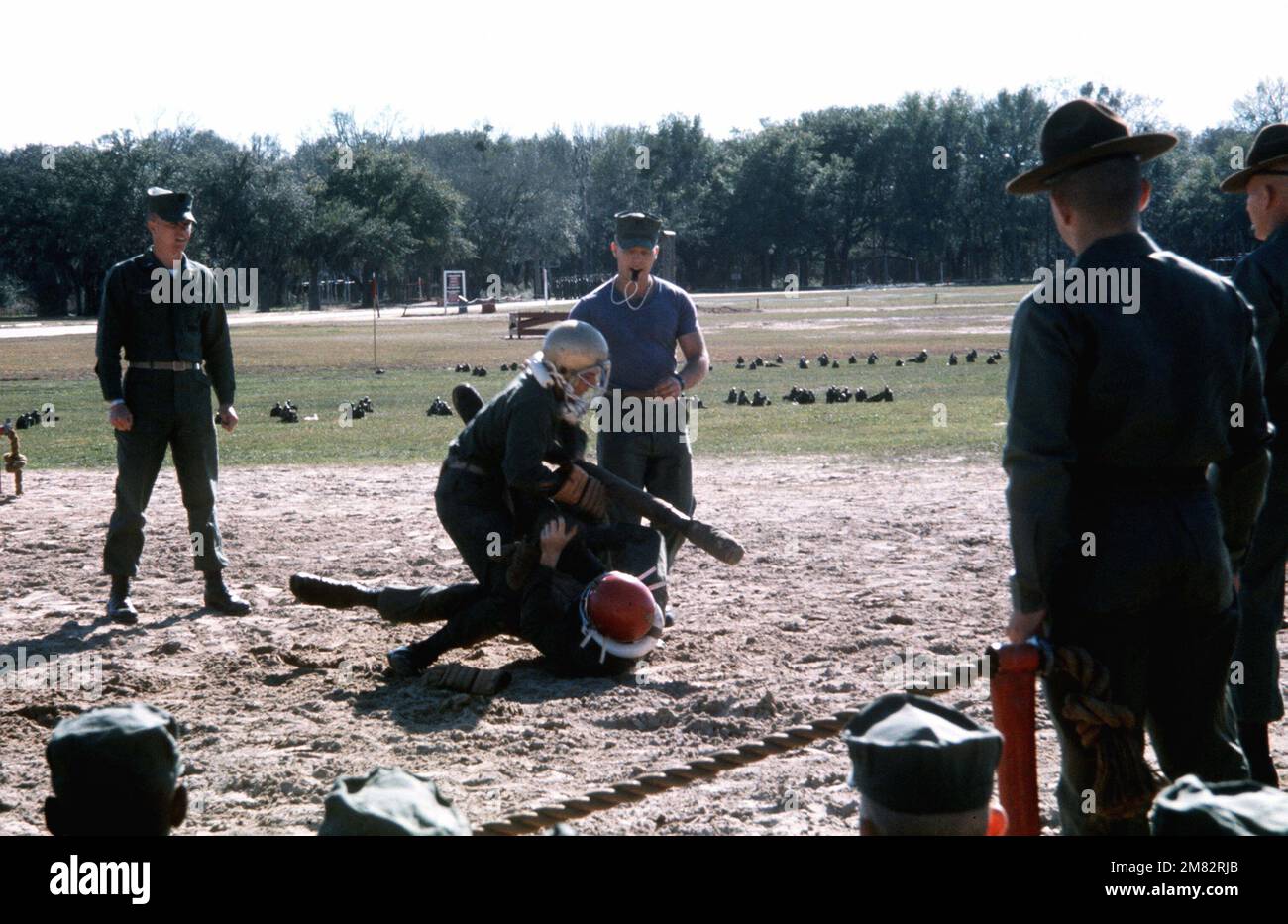 Recruits practice pugil-stick techniques during hand-to-hand combat ...