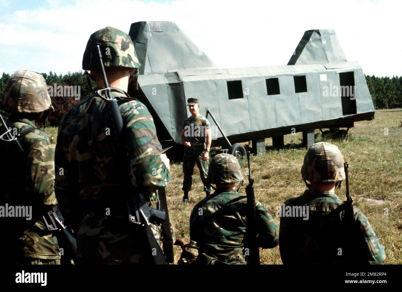 A helicopter mock-up is used during individual combat training for ...