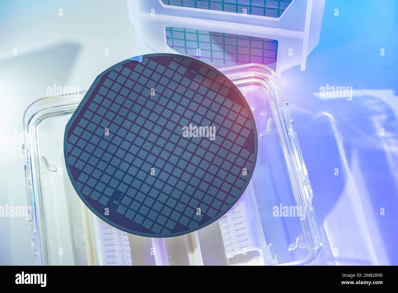silicon wafers have a silicon dioxide coating sitting in a quartz wafer ...