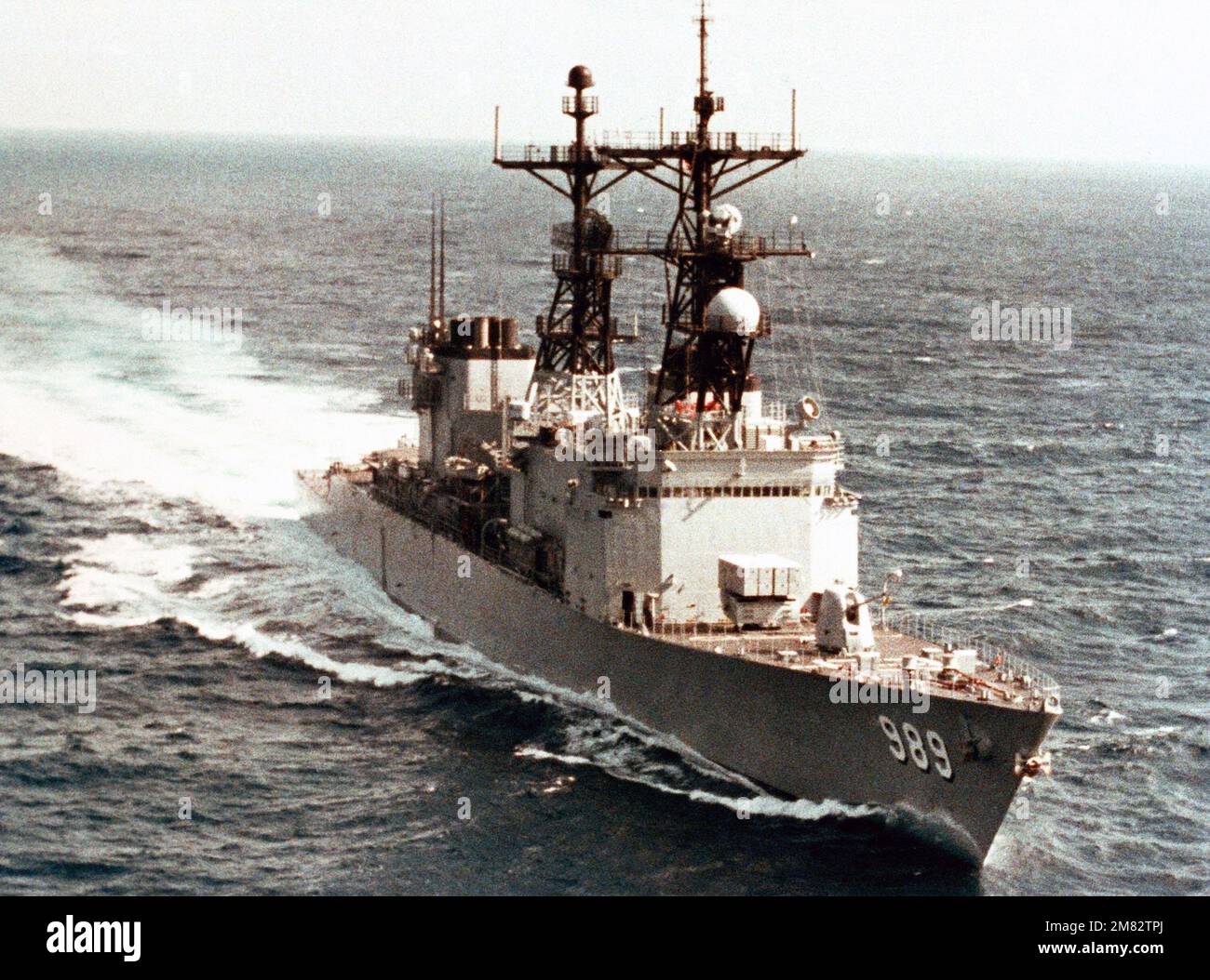 Aerial starboard bow view of the Spruance class destroyer USS DEYO (DD ...