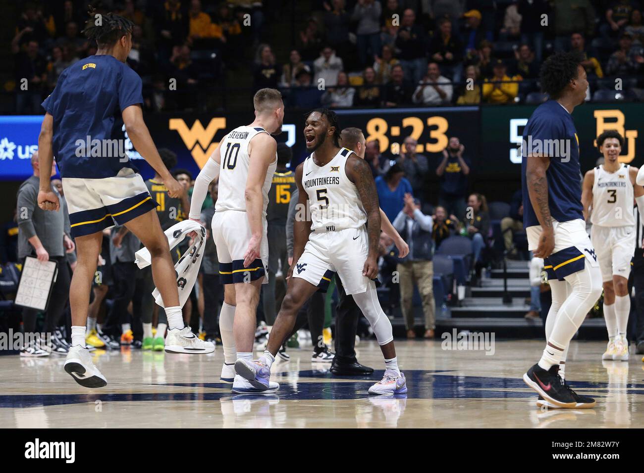 West Virginia players celebrate after a score against Baylor during the ...