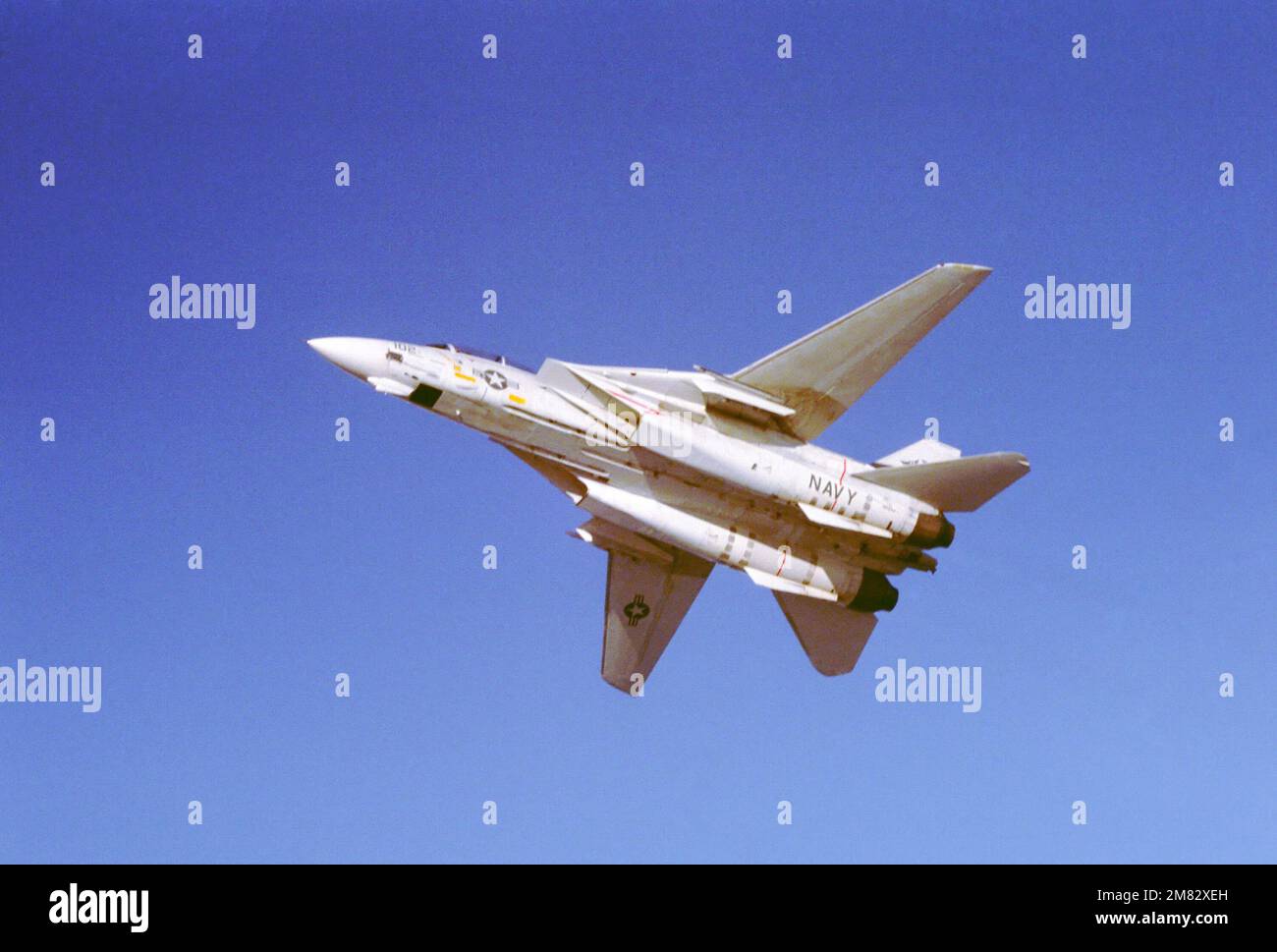 Bottom view of the F-14A Tomcat aircraft in flight. Country: Unknown ...