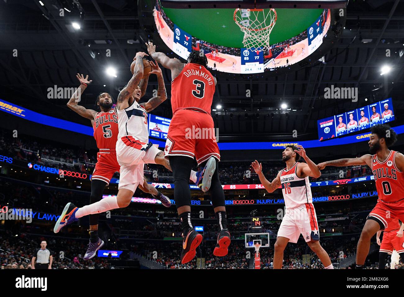 Washington Wizards forward Kyle Kuzma, second from left, goes to the ...