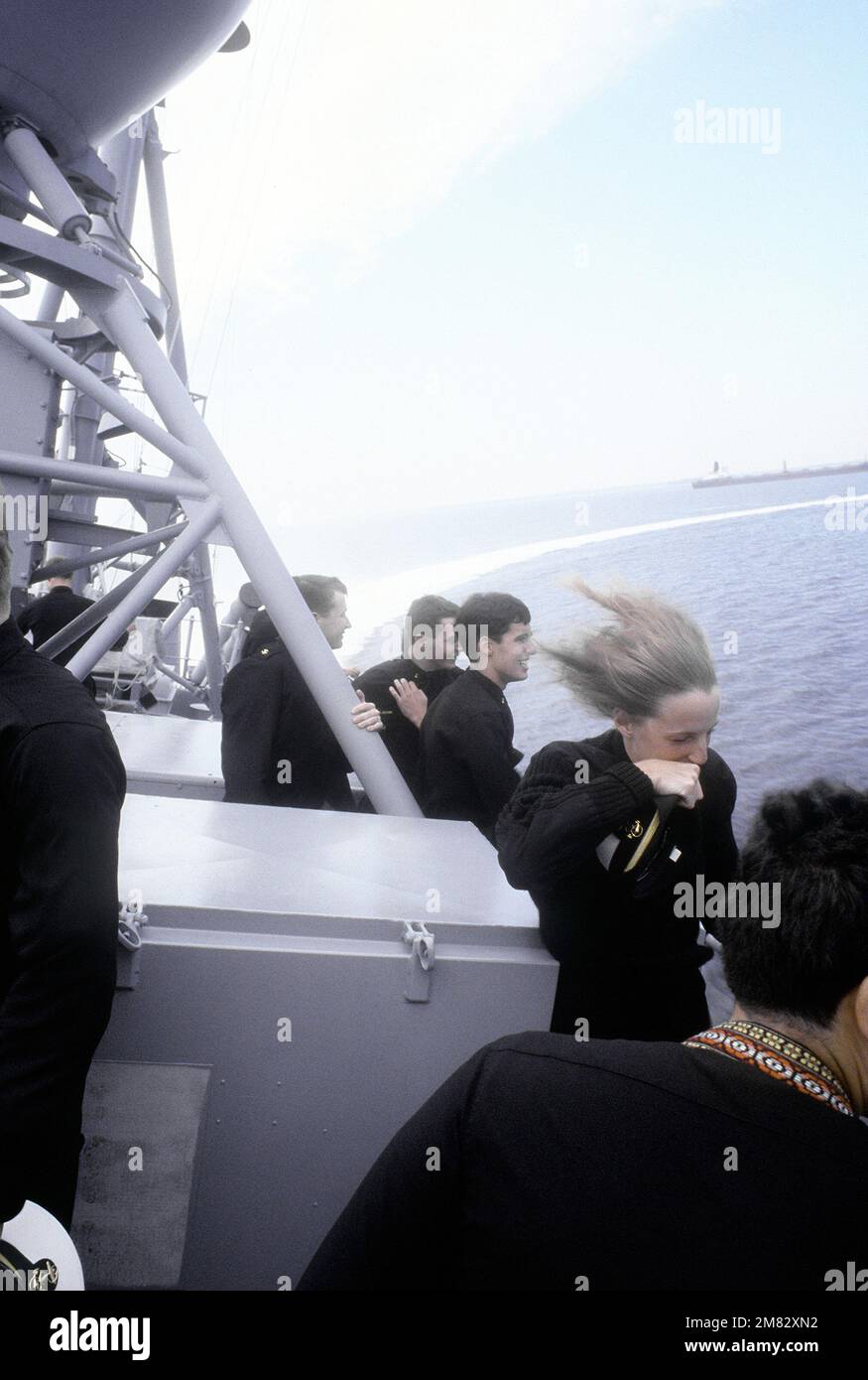 Midsheipmen watch from the port bridge wing of the Pegasus-class patrol ...