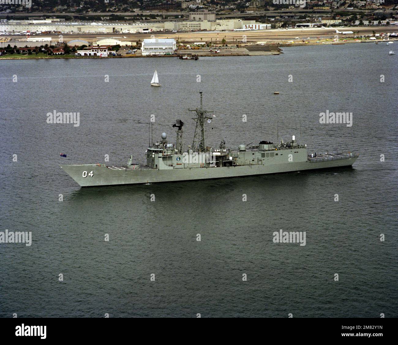 An aerial port bow view of the Australian frigate HMAS DARWIN (F-04 ...