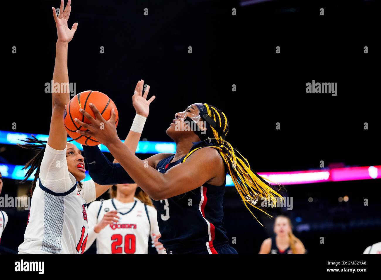 Connecticut's Aaliyah Edwards, right, shoots over St. John's Jillian ...