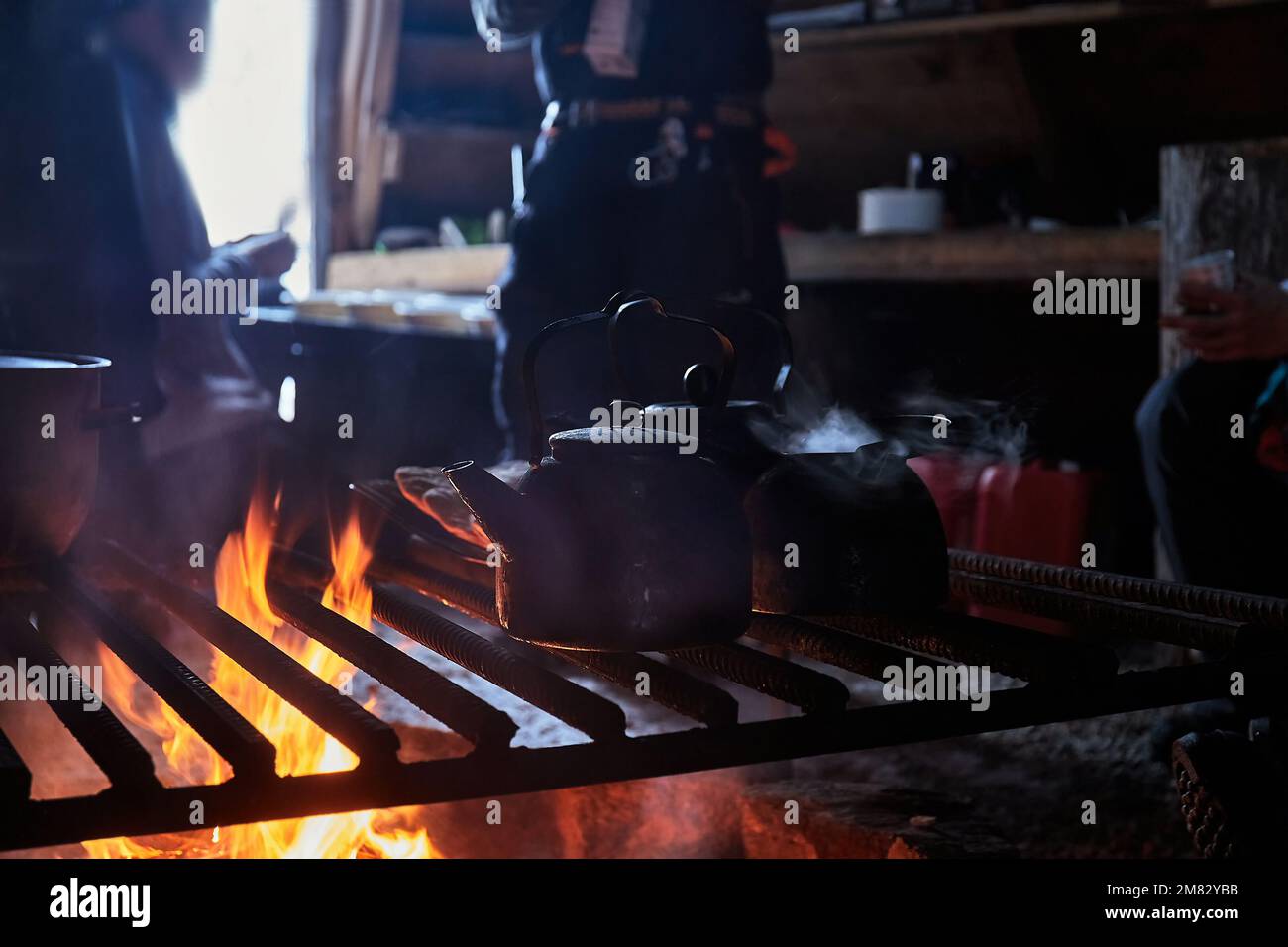 Flames of a fireplace wood fire in refuge hut Stock Photo - Alamy