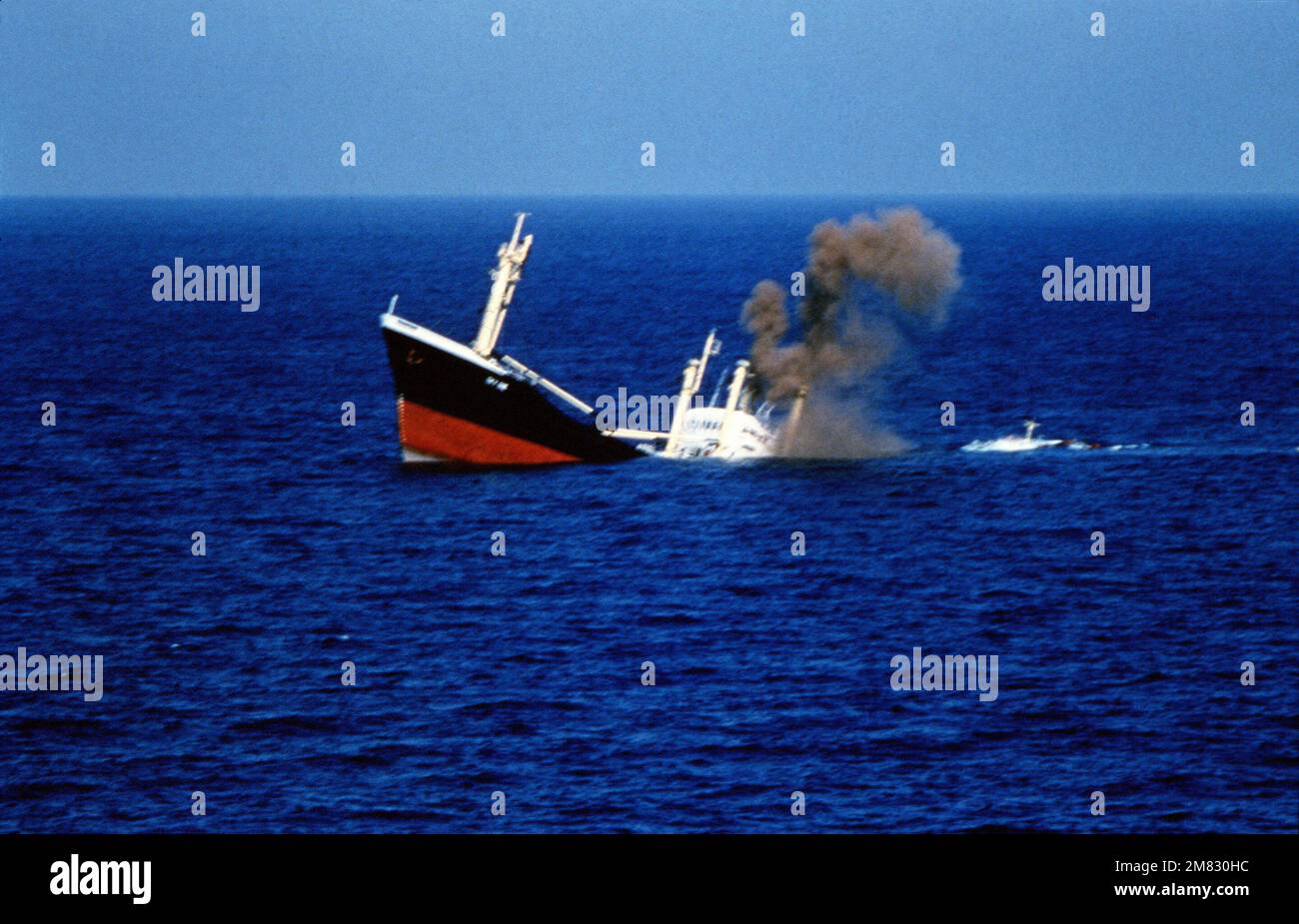 A port side view of the sinking Panamanian ship "SKY ONE". The tank ...