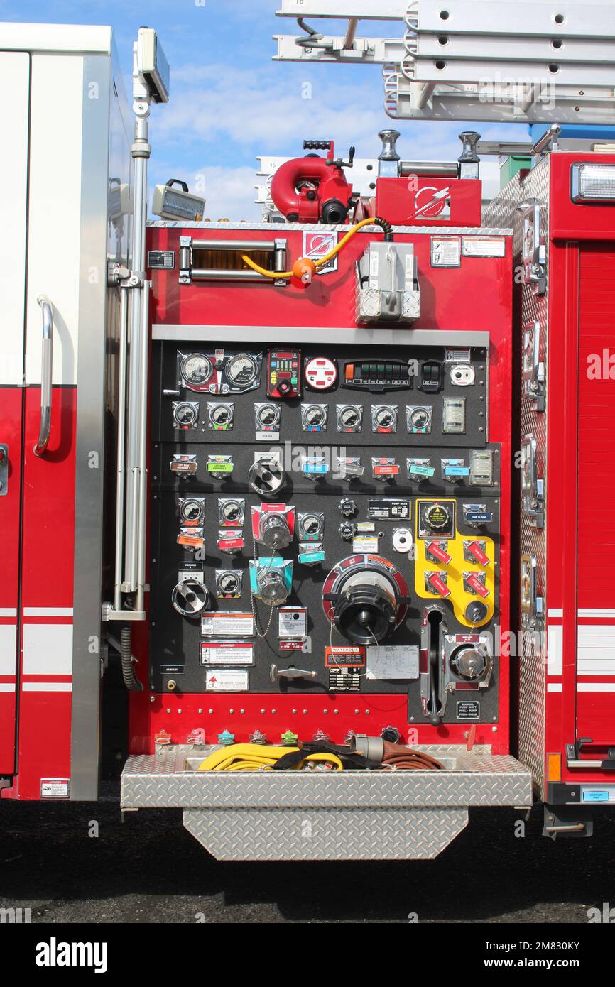 Closeup of American fire engine hose valve and connector panel Stock ...