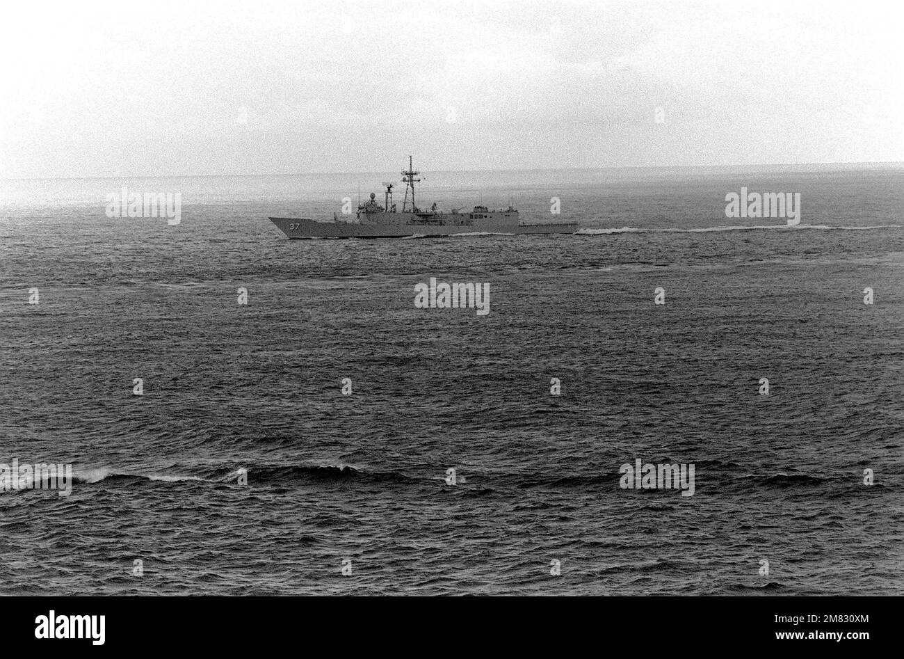 A port beam view of the guided missile frigate USS CROMMELIN (FFG 37 ...