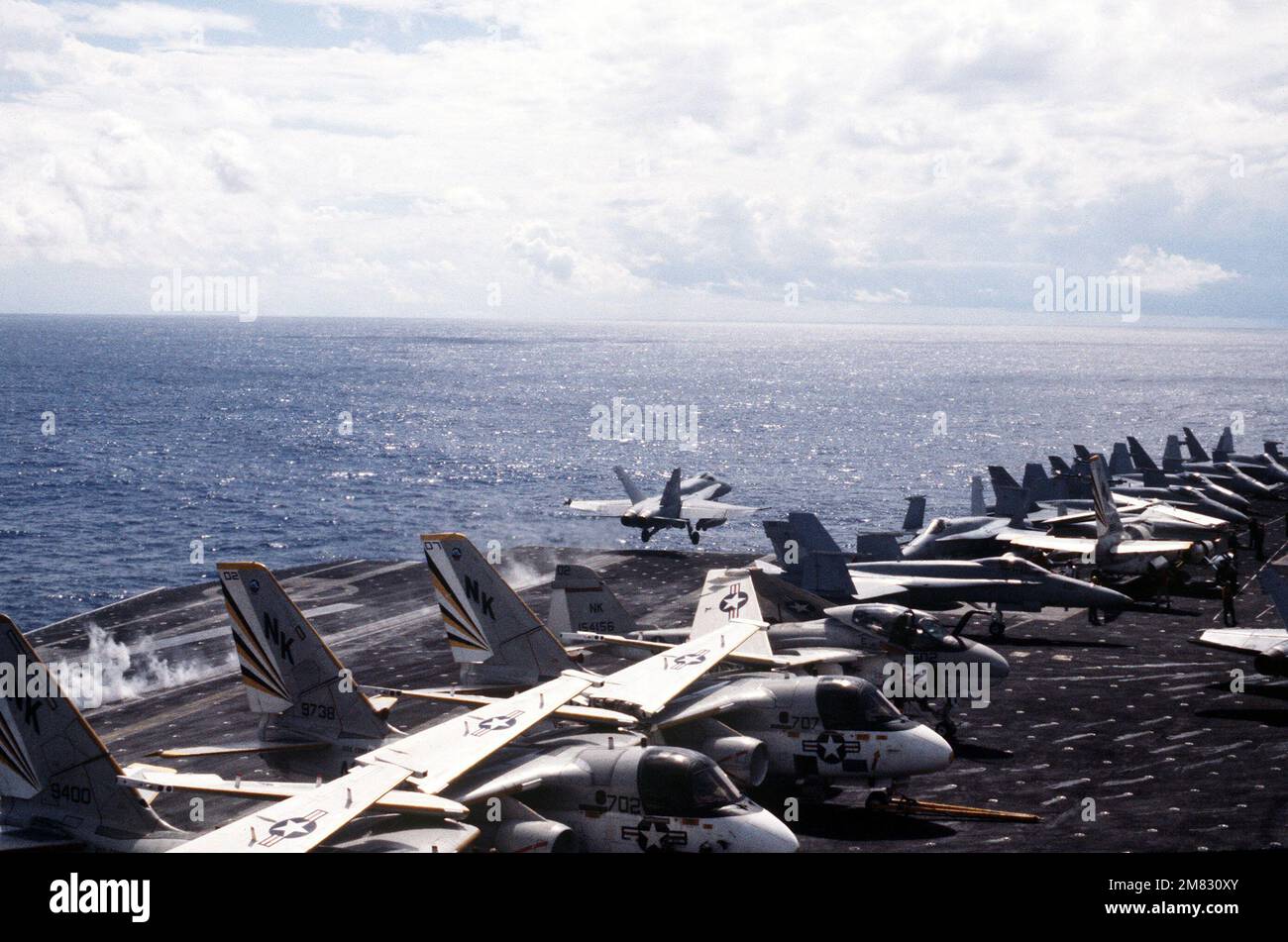 An F/A-18 Hornet aircraft is launched from the aircraft carrier USS ...