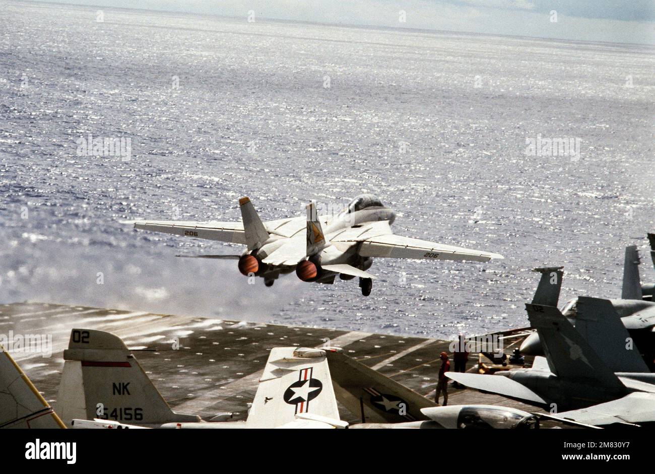 An F/A-14A Tomcat aircraft from Fighter Squadron 21 takes off from the ...
