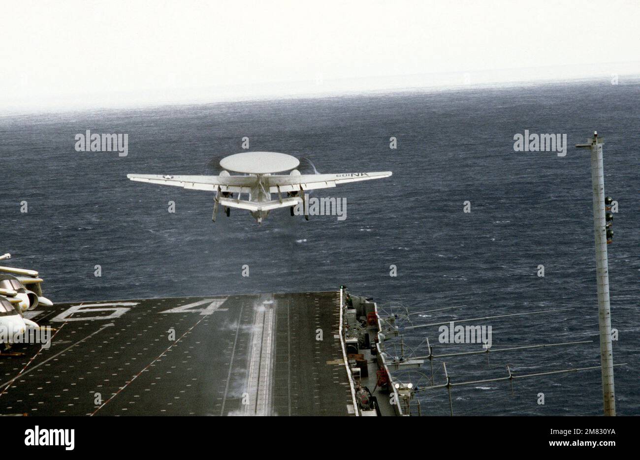 An E-2B Hawkeye aircraft takes off from the aircraft carrier USS ...