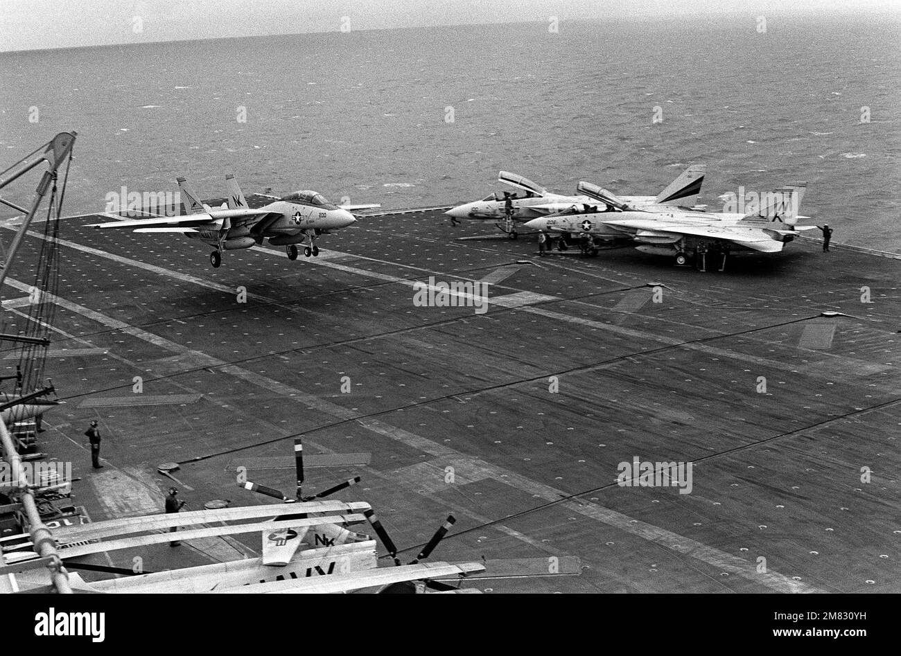 An F-14A Tomcat aircraft from Fighter Squadron 21 lands aboard the ...
