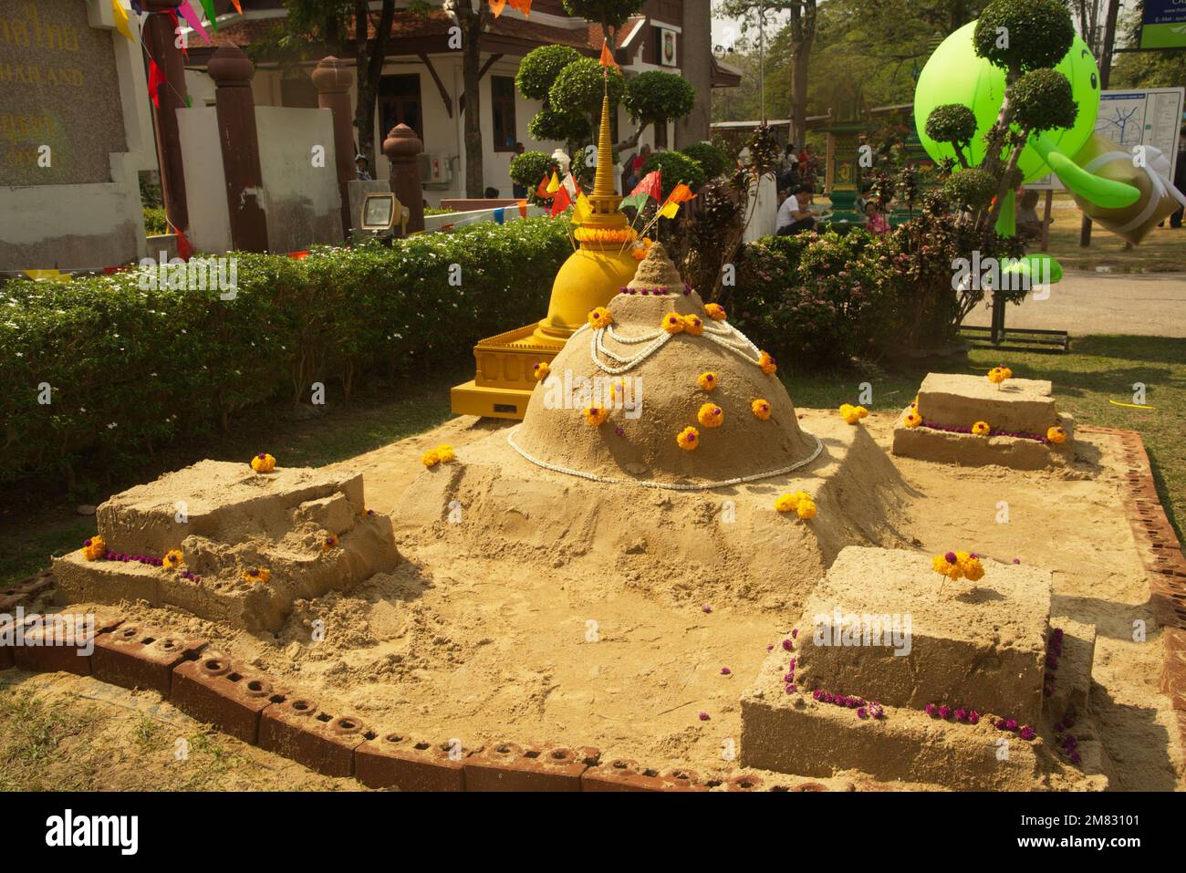 Thai people build stupa with sand because of their faith in Buddhism ...