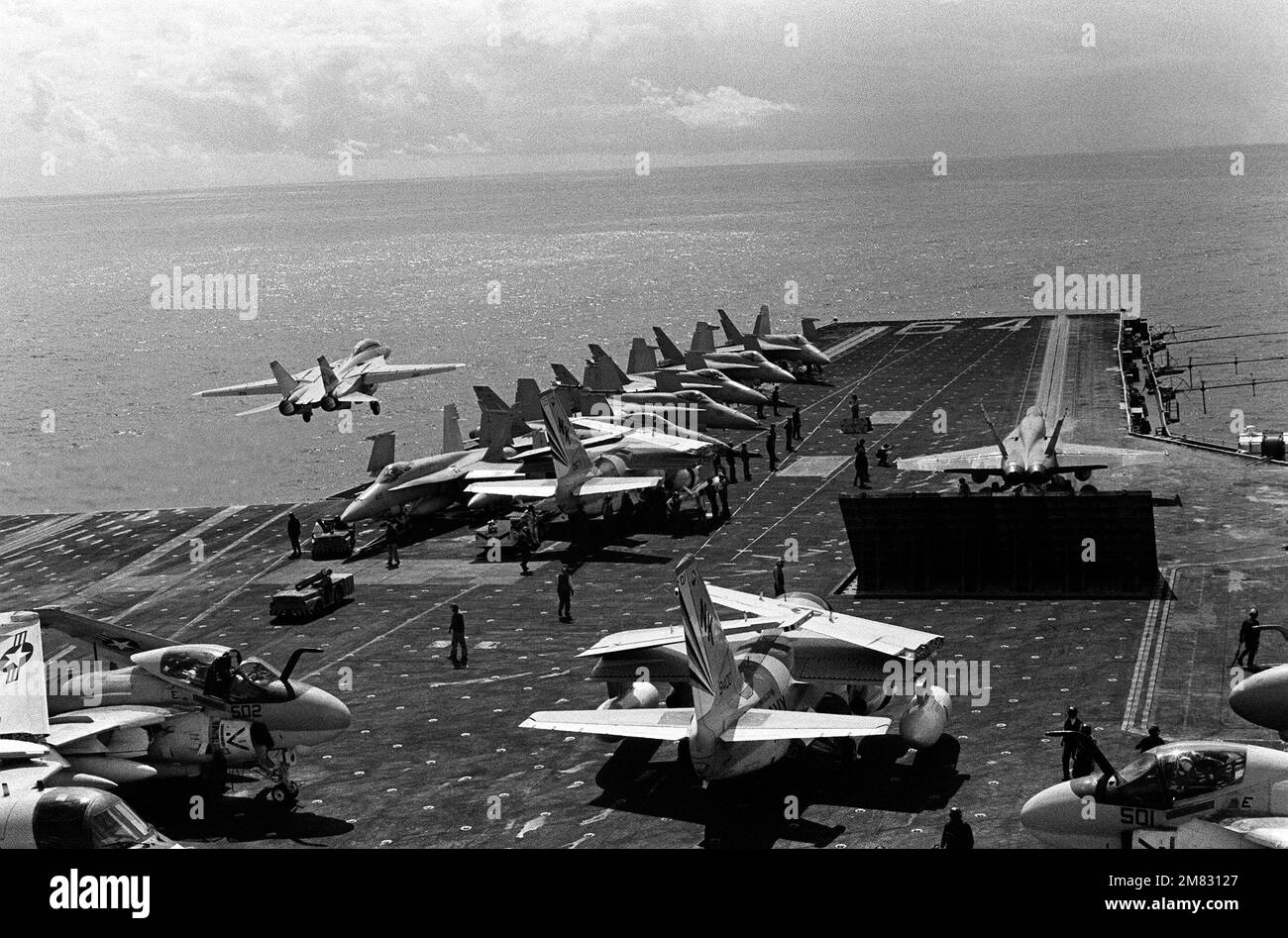 An F-14A Tomcat aircraft takes off from the aircraft carrier USS ...