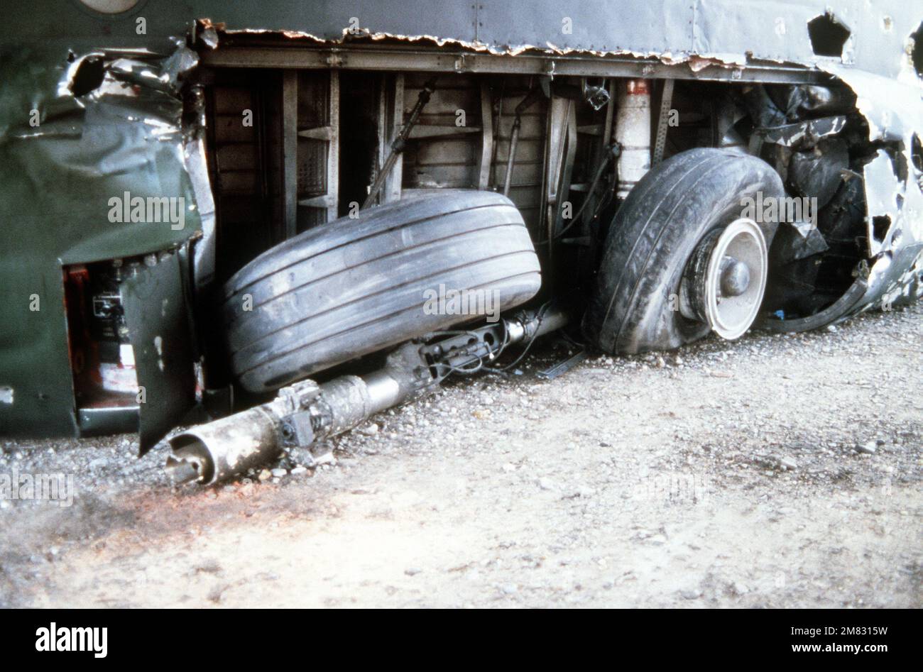 The damaged landing gear, after a crash landing of a 37th Tactical ...