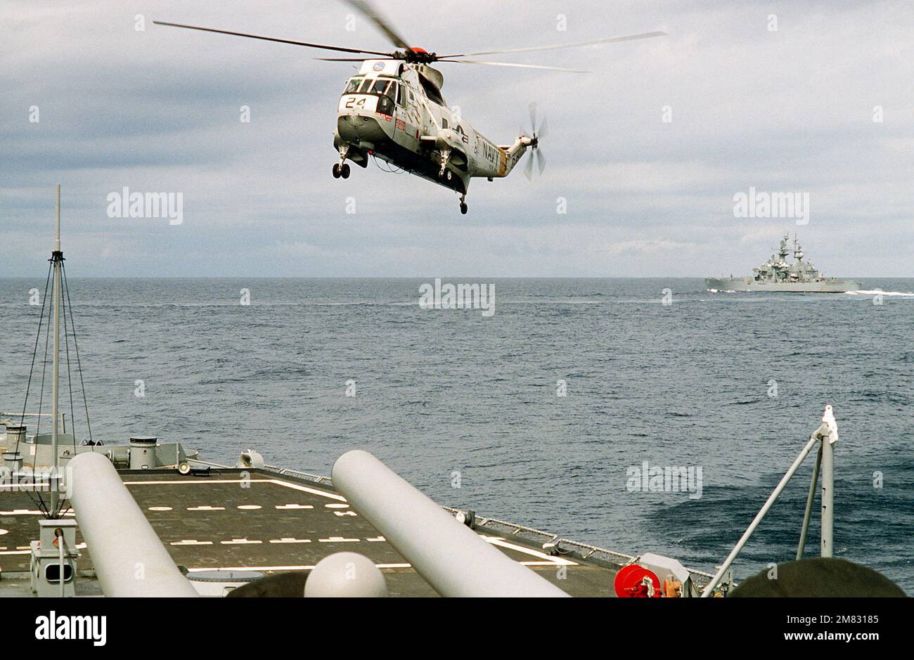 An SH-3 Sea King helicopter approaches for a landing on the helicopter ...