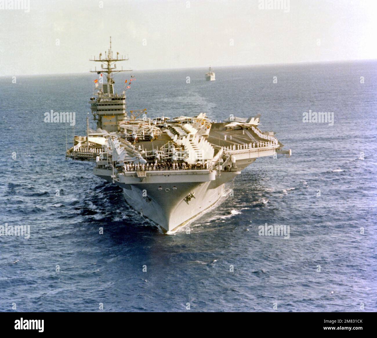 An elevated bow view of the nuclear-powered aircraft carrier USS CARL ...