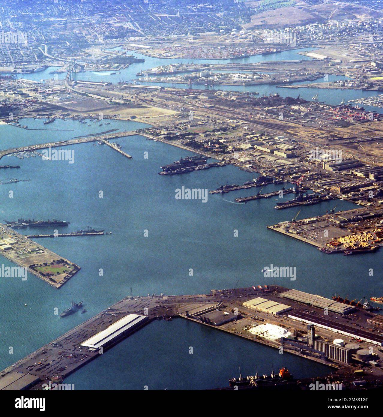 An aerial view of the harbor and shipyard area. (Substandard image ...