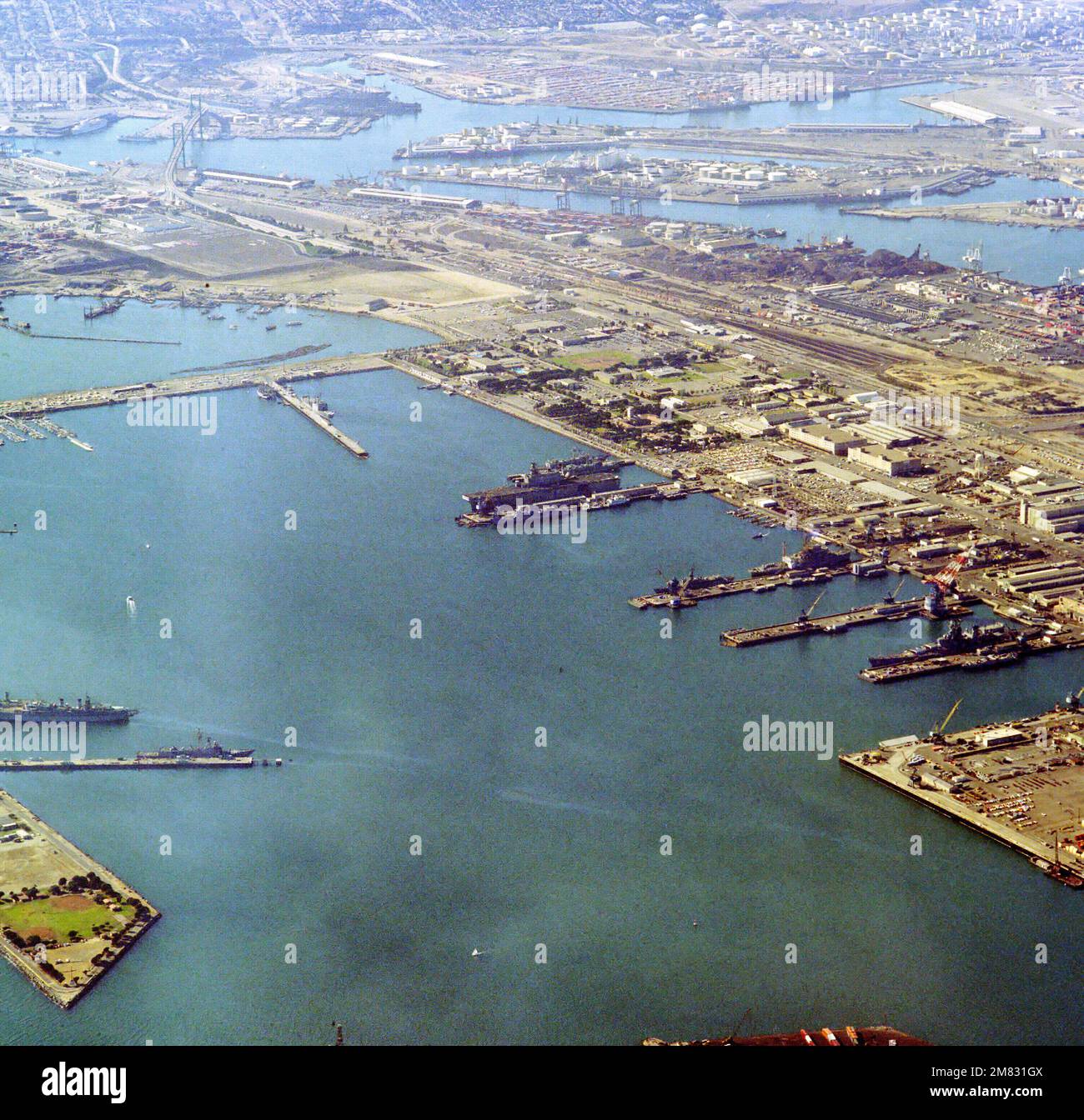 An aerial view of the harbor and shipyard area. Base: Naval Station ...