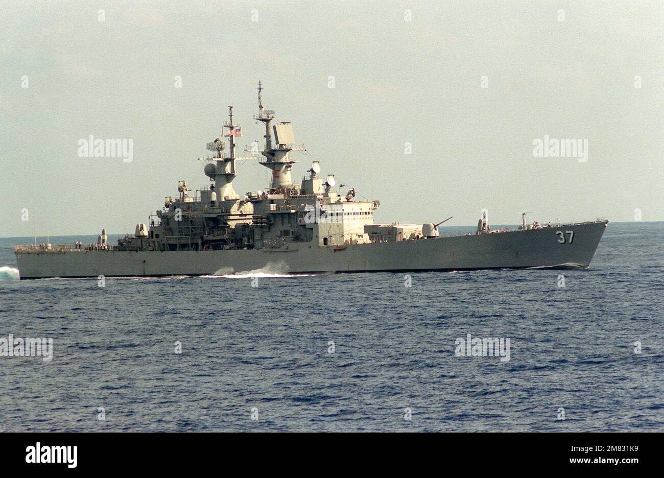 A starboard bow view of the nuclear-powered guided missile cruiser USS ...