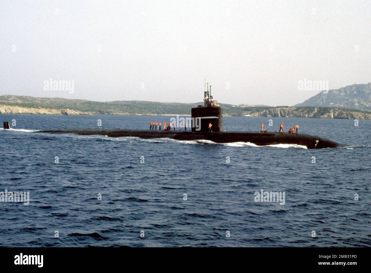 A starboard beam view of the nuclear-powered attack submarine USS BATON ...