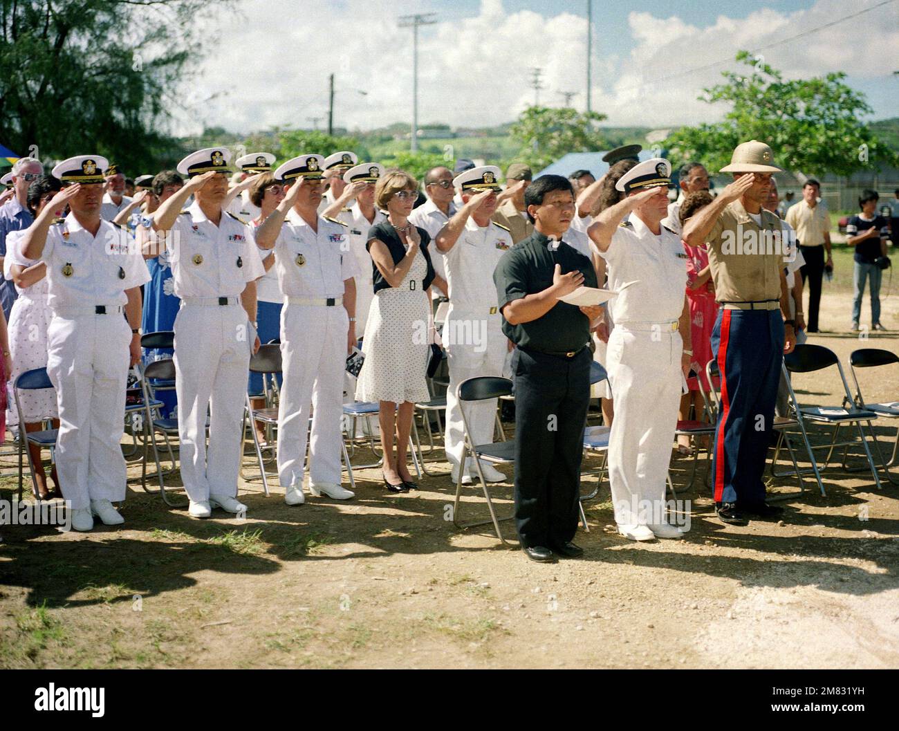 Distinguished guests salute during the dedication ceremony for the ...